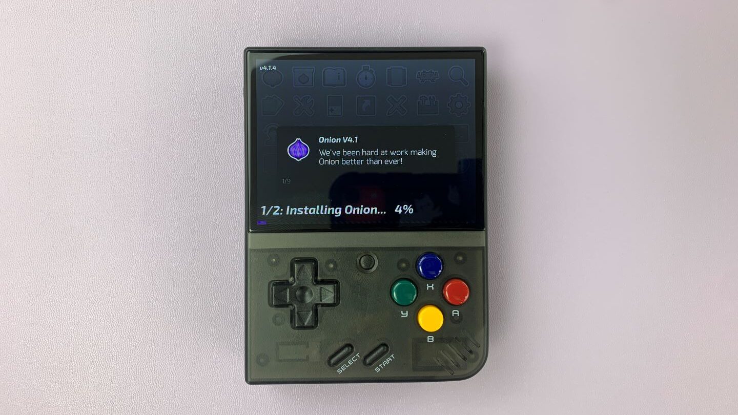 The device will automatically begin installing OnionOS and RetroArch , let it complete this part ...
